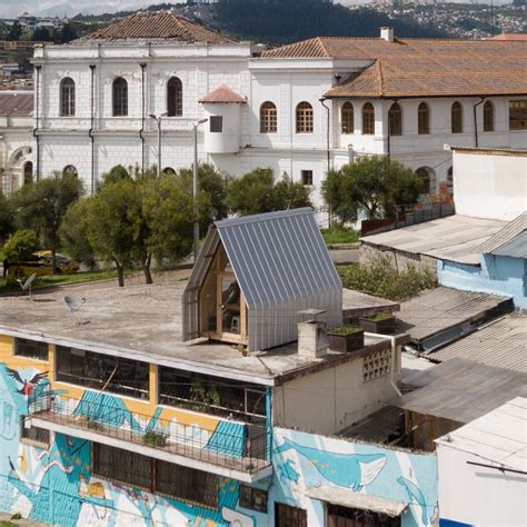 10 Parasitic Dwellings That Cling To Other Buildings