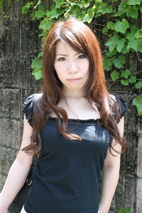 Pretty Asian Brunette Rie Obata Kneads Her Hairy Pussy With A Vibrator