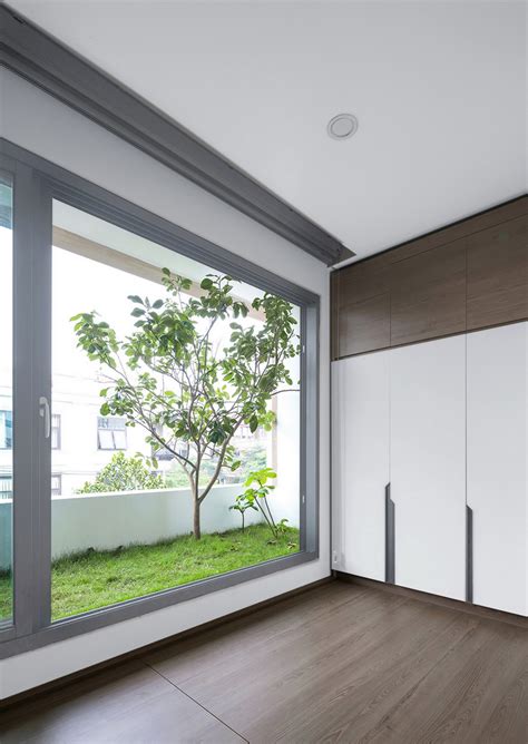 Landmak Architecture Builds House In Vietnam With Planted Courtyards