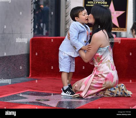 Lucy Liu Kisses Her Son Rockwell Lloyd L As They Attend The Star Unveiling Ceremony Honoring