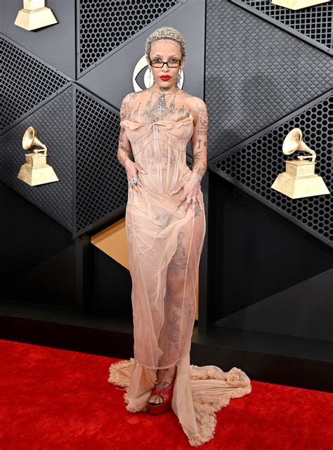 Doja Cat In Tube Top Shows Off Shapely Legs In New Photos