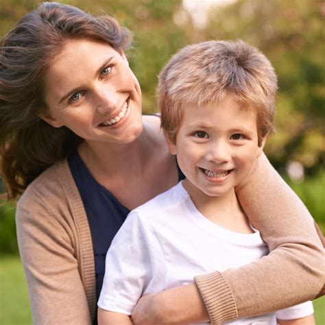 Premium Photo Mother Son And Hug With Park Love And Smile With