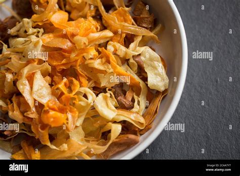 A Bowlful Of Deep Fried Homemade Crisps Made From Carrots Parsnips And Sweet Potato Dorset