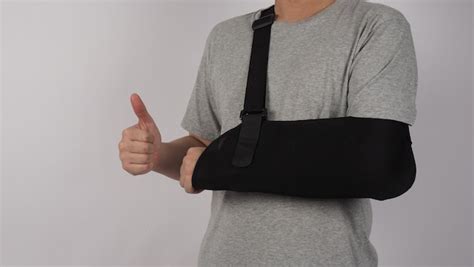 Premium Photo Broken Arm Arm Sling Therapy Support And Covered Around