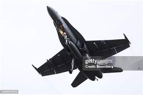 A Boeing F18 Twin Engined Multi Role Fighter Jet In The Air During