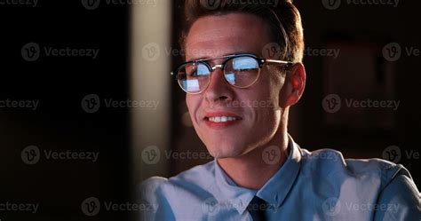 Man Working On Computer In Dark Office 11291171 Stock Photo At Vecteezy