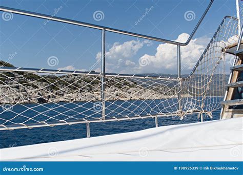 Metal Deck Railing With Rope Safety Mesh On Sea Sailboat Stock Image Image Of Closeup Marine