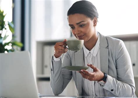Coffee Keeps Me Going On My Busy Days An Attractive Young