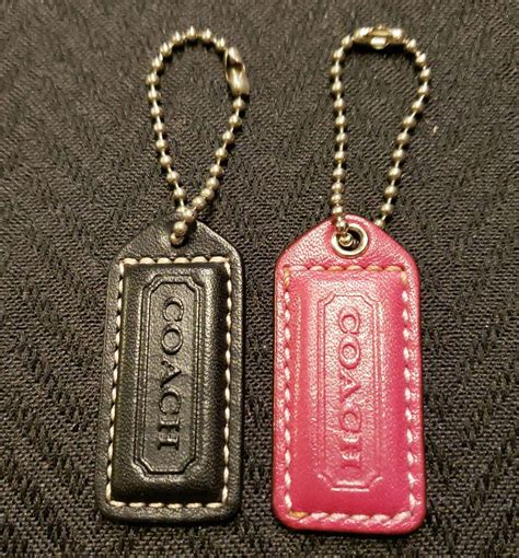 コーチcoach バッグチャーム 黒とピンクセット メルカリ