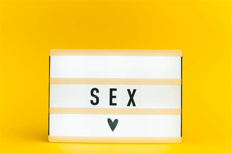 Premium Photo Light Box With Text Sex On Yellow Wall Premium Photo Light Box With Text Sex On Yellow Wall