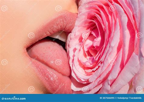 Woman Kissing Red Rose Flower Lips With Lipstick Closeup Beautiful
