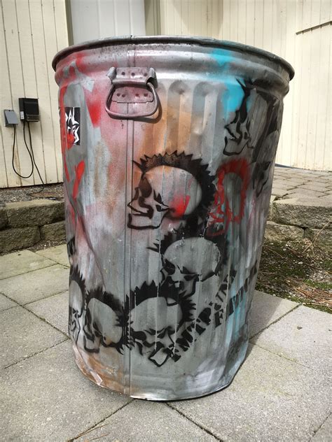 Trash Becomes Art Graffiti On Metal Trash Can Graffiti Covered