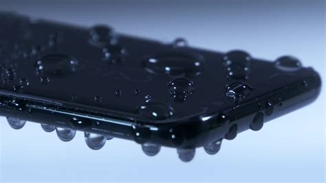 Wet Water Resistant And Waterproof Smartphone Covered With Droplets