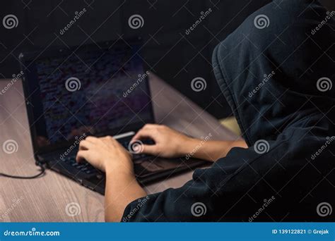 Hooded Hacker Using Laptop To Break Systems Stock Image Image Of Coding Person 139122821