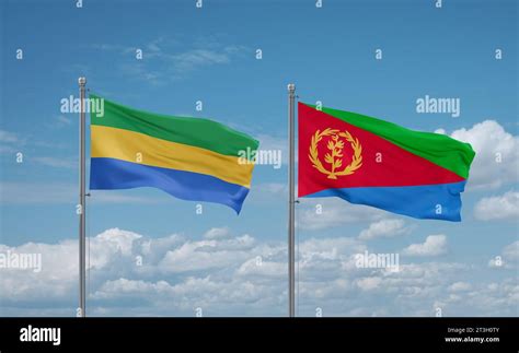 Eritrea And Gabon Flags Waving Together In The Wind On Blue Cloudy Sky Two Country Relationship