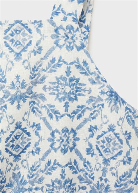 بنطال طويل بحمالات عليه طباعة من الكتان المختلط الأطفال Mango الكويت