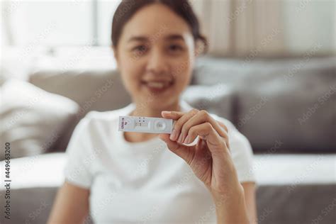 Woman Self Test For COVID 19 Home Test Kit Asian Woman Showing Result Coronavirus Rapid Antigen