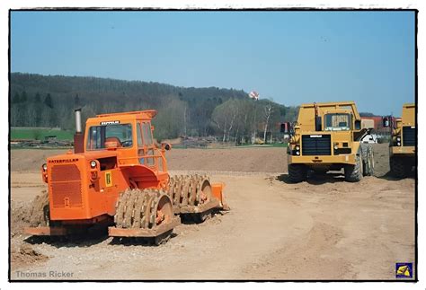 Bagger Galerie Construction Machines: CATERPILLAR 815 Compactor Fa. Riebl