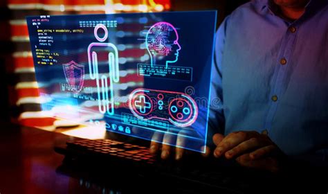 Man Typing On Keyboard With Game Creating On Hologram Screen Stock