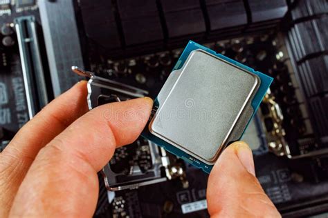 Assembly Process Of A Desktop Computer Involves Technician Plugging Cpu