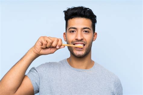 Premium Photo Young Man Shaving His Beard