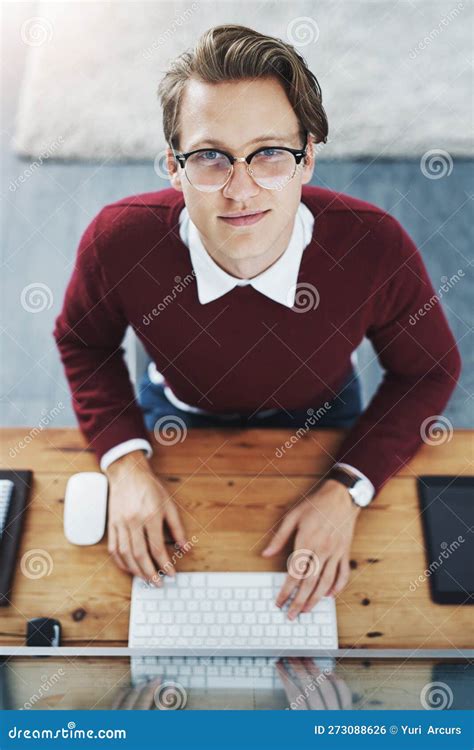 The Top Is Right In My Sights High Angle Shot Of A Young Man Using A
