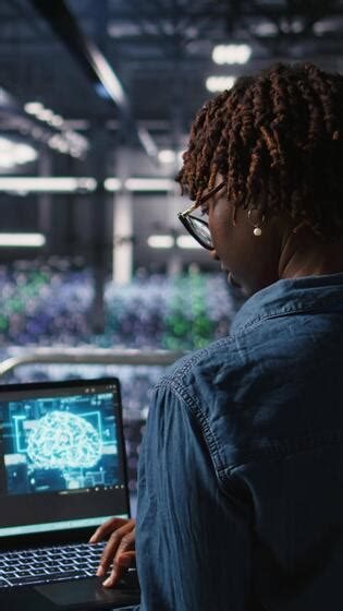 Vertical Data Center Coworkers Doing Maintenance On Mainframes Handling Ai Processing Tasks