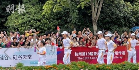 杭州亞運火炬最後一程傳遞民眾熱烈揮旗歡 E123長青網 長者服務及老人院資訊