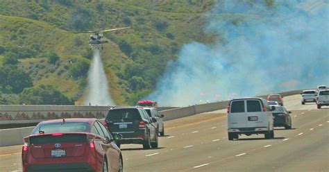 Firefighters Battle Brush Fire Near Golden State Freeway In Valencia