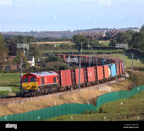 Db Cargo Class 66 Diesel Locomotive 66124 On The West Coast Mainline In Cumbria With A Liverpool