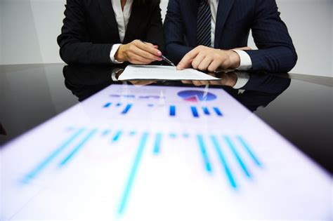 Free Photo Businessman Pointing To A Document