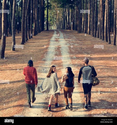 Friends Walking Exploring Outdoors Concept Stock Photo Alamy