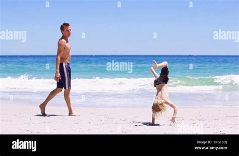 Father Doing Handstands With Her Son Stock Video Footage Alamy