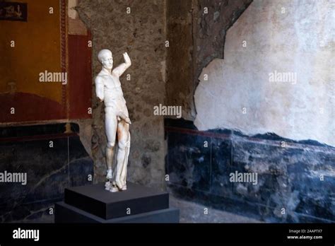 Ancient Statue Of Priapus Symbol Of The Fertility In Pompeii Stock
