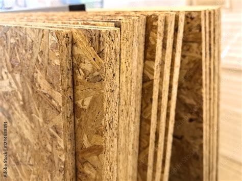 Exploring The Texture And Layers Of Engineered Wood In A Workshop