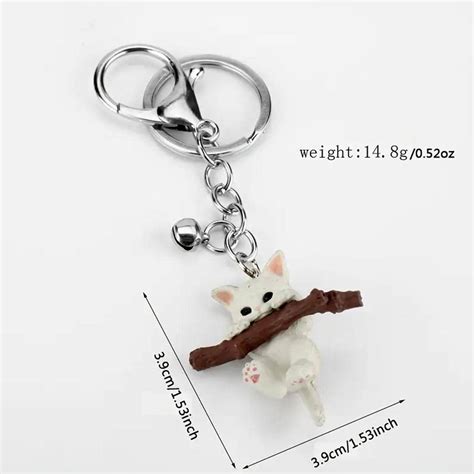 1 Pieza Llavero Con Gatito Blanco Y Campanita Simulando Una Rama Llavero De Gatito Blanco Lindo