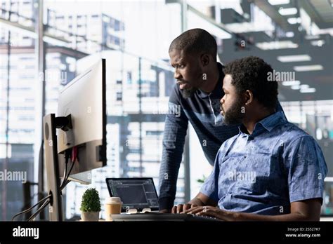 Data Engineering It Staff Members At Pc Desk Developing Machine Learning Algorithms African