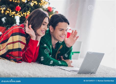 Photo Of Young Satisfied Couple Guy With Girlfriend Talking Online