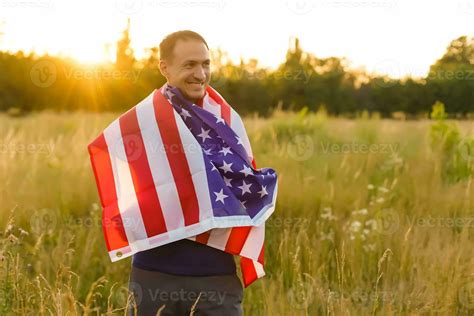 Fourth Of July Patriotic Man With The National American Flag In The