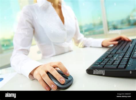 Image Of Female Hands Pushing Keys Of A Computer Mouse And Keyboard Stock Photo Alamy