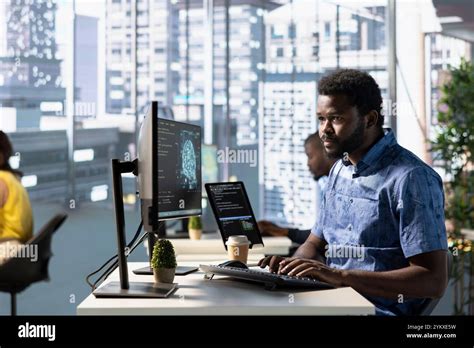 Computer Scientist Working With Machine Learning Tech Advancing Ai Critical To Innovation Of