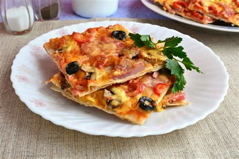 Пицца на тонком лаваше в духовке 10 фото в рецепте
