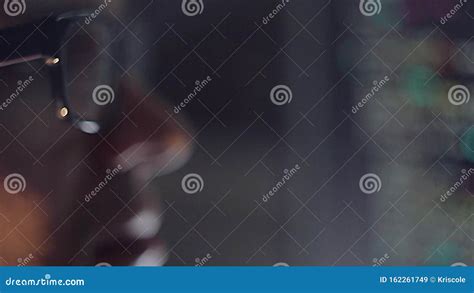 Programmer And Analyst Working At The Monitor Writing Code The Monitor Reflection In The