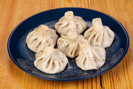 khinkali在陶瓷盘子上煮熟高清图片下载 正版图片502831952 摄图网