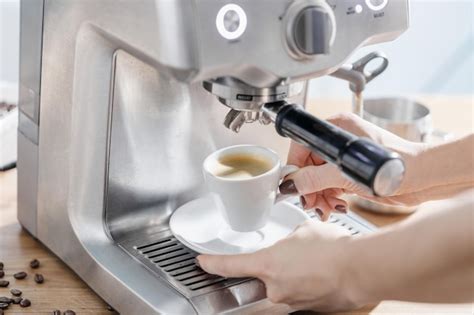 Free Photo Woman Cooking Espresso With Machine Free Photo Woman Cooking Espresso With Machine
