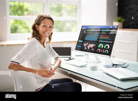 Analyst Woman Looking At Business Data Analytics Dashboard Stock Photo Alamy