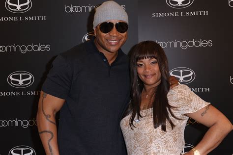 Ll Cool Js Wife Simone Smith Stuns In Red And Pink Jacket With Matching Hat And Hoop Earrings