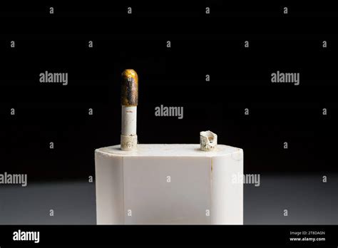 Old Broken Socket Plug Close Up On A Dark Background Careless Behavior With The Plug Of An