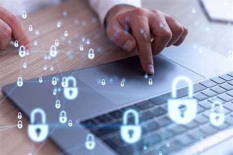 Premium Photo A Programmer Is Typing A Code On Computer To Protect A