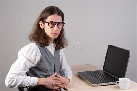 Programming And Application Development A Young Man Writes Code